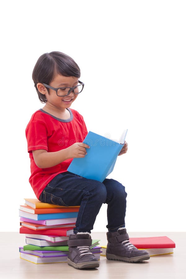 Cute boy reading a book stock photo. Image of male, isolated - 41463766