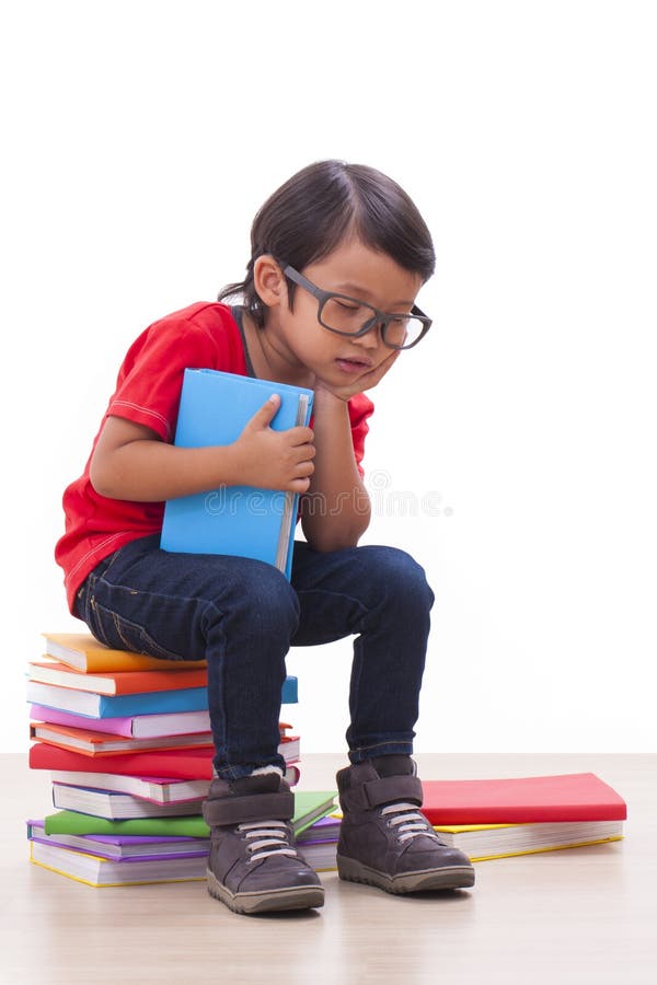 Cute boy reading a book stock photo. Image of isolated - 41463824