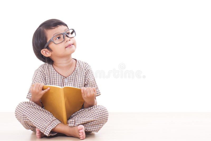 Cute boy is reading a book stock image. Image of education - 41465387