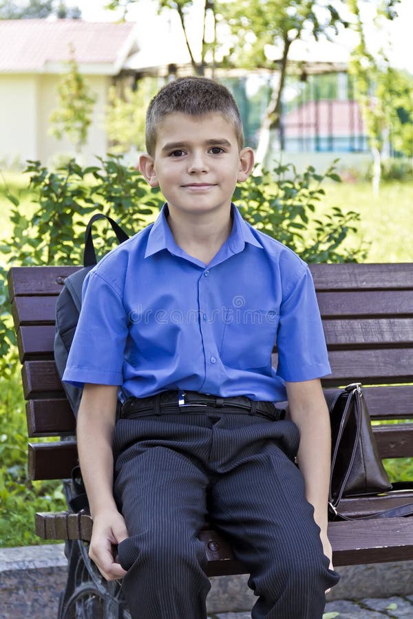 Cute Boy are Sitting on the Bench Stock Photo - Image of family ...