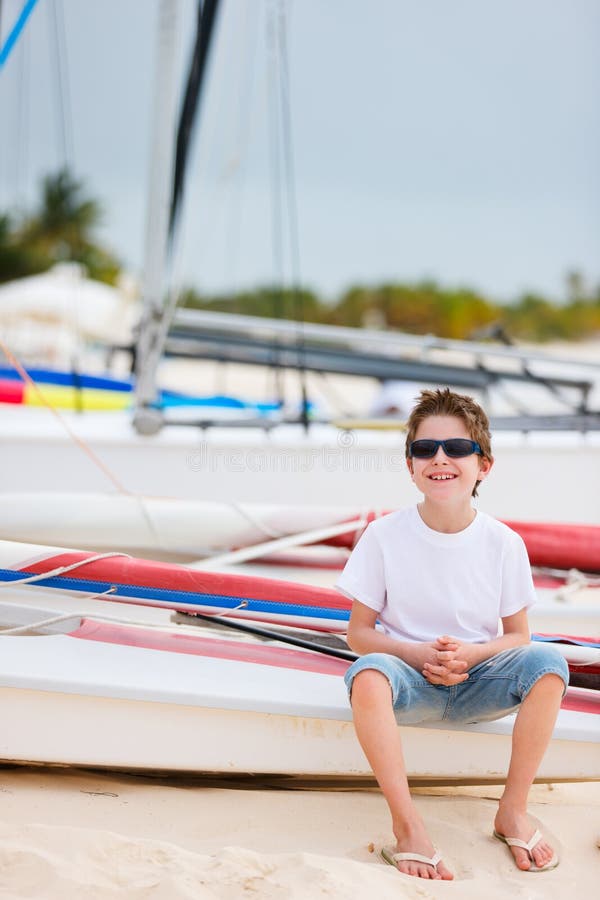 Cute boy at beach stock photo. Image of sail, childhood - 29835320