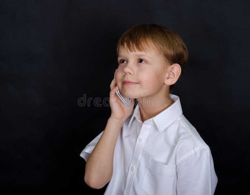 Cute Boy with a Smile Talking on the Phone Stock Image - Image of ...