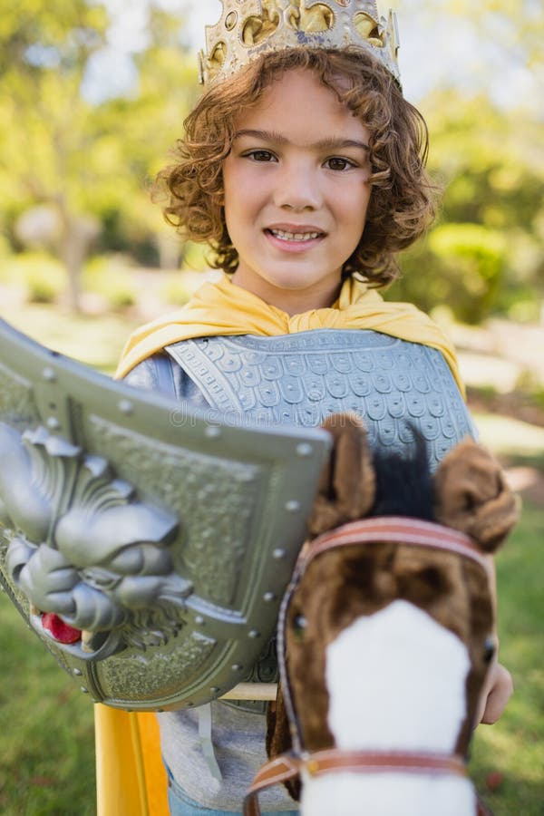 Cute Boy Standing and Pretending To Be a Knight Stock Photo - Image of ...