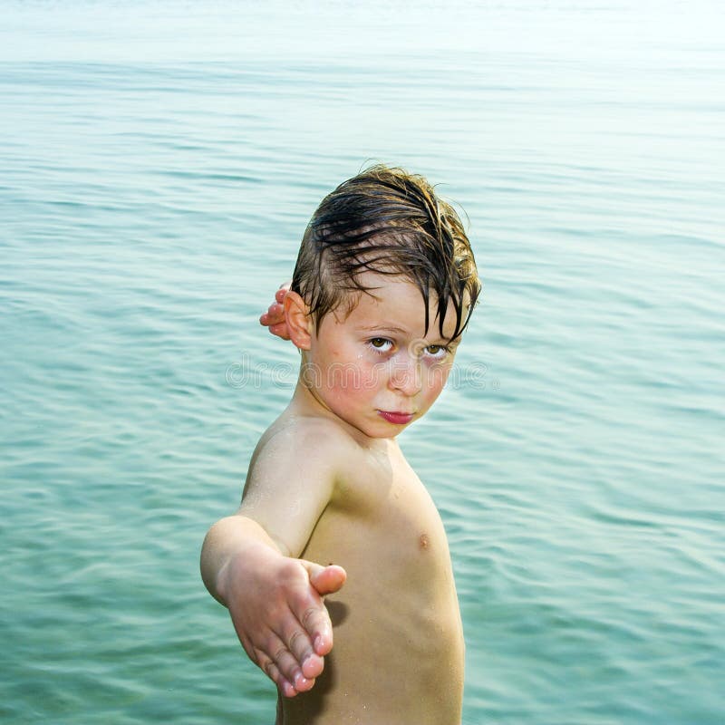 Cute Boy Standing in the Water of the Beach in Venice, Italy, Stock ...