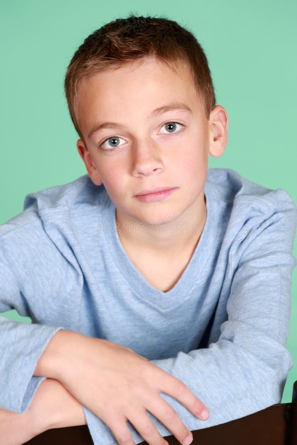 Cute boy with sad face stock photo. Image of frown, look - 19354636