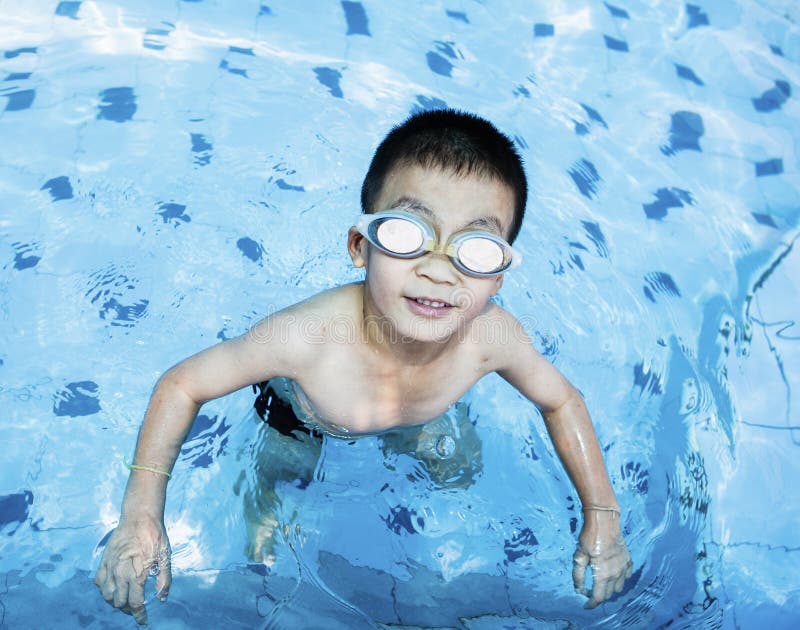 Cute Boy Swimming and Playing in Swimming Pool Stock Photo - Image of ...