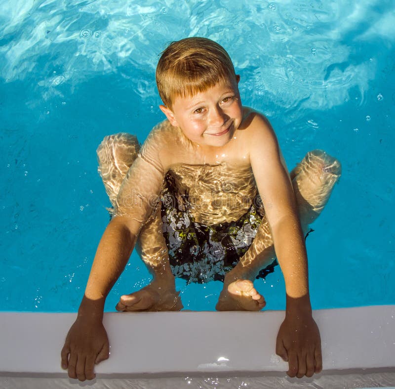 Boy at Pool stock image. Image of goggle, relaxing, cement - 1599187