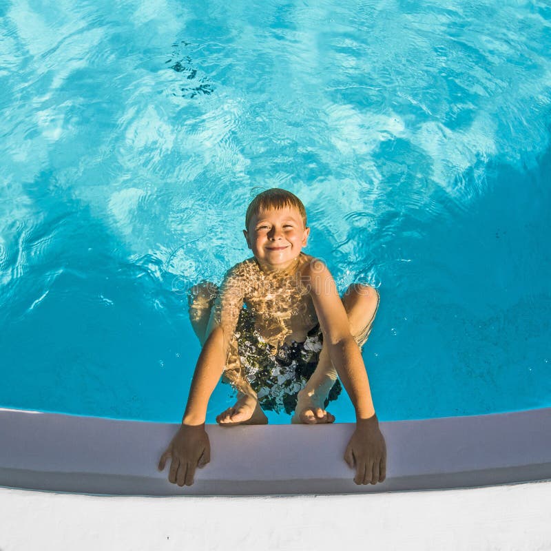 Cute Boy in Swimming Pool Laughes Stock Image - Image of posing ...