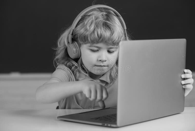 Cute Boy Wearing Headphones, Study with Laptop in Classroom, Listening ...