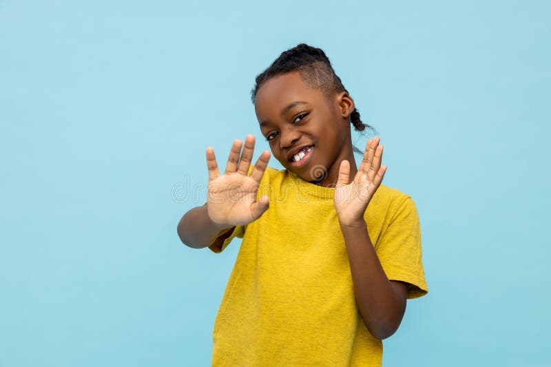 Cute Boy in Yellow Tshirt Looking Shy and Smiling Stock Image - Image ...