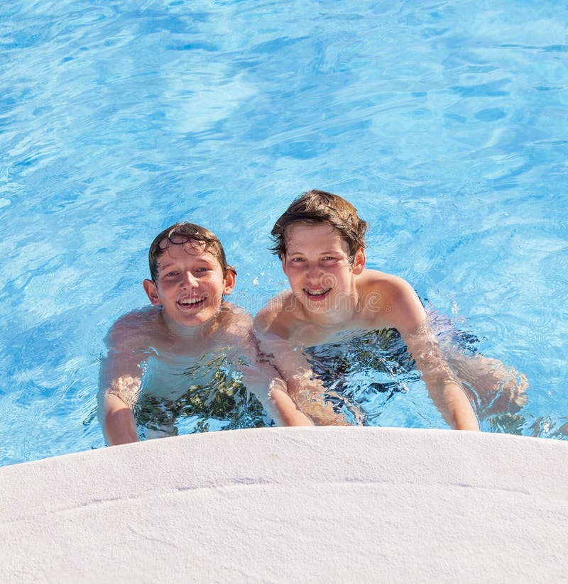 Boys have fun in the pool stock photo. Image of funny - 37346734