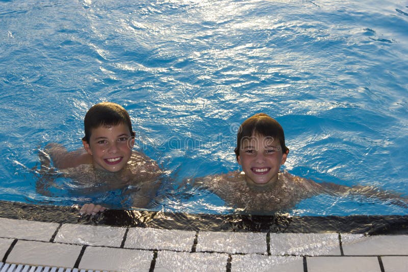 Cute Boys Swimming and Playing in Water Stock Image - Image of splash ...