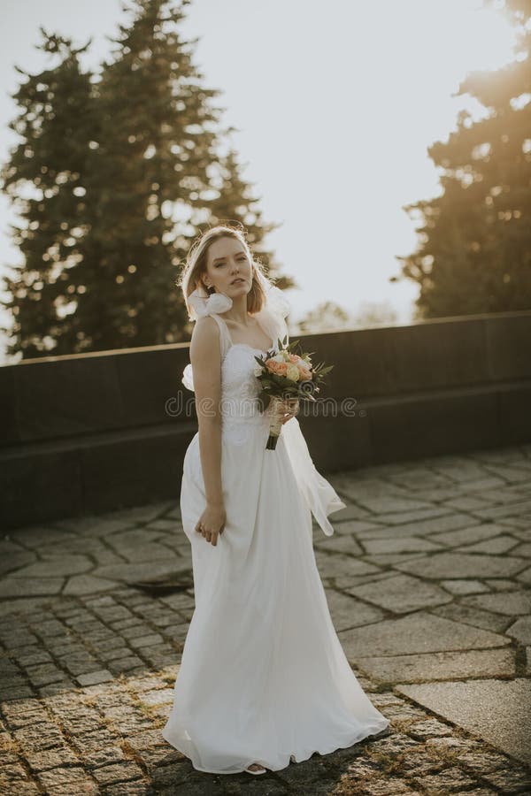 Cute Bride with Flower Bouquet Stock Image - Image of wedding, lovely ...