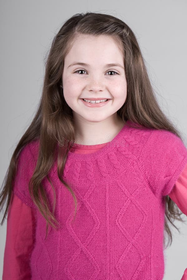 Cute Brown Haired Girl Looking Up Off Camera Stock Image - Image of ...