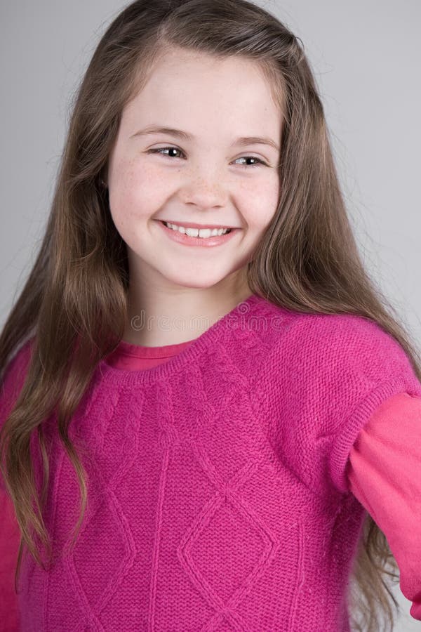 Cute Brown Haired Child Smiling Stock Photo - Image of shine, shoulder ...