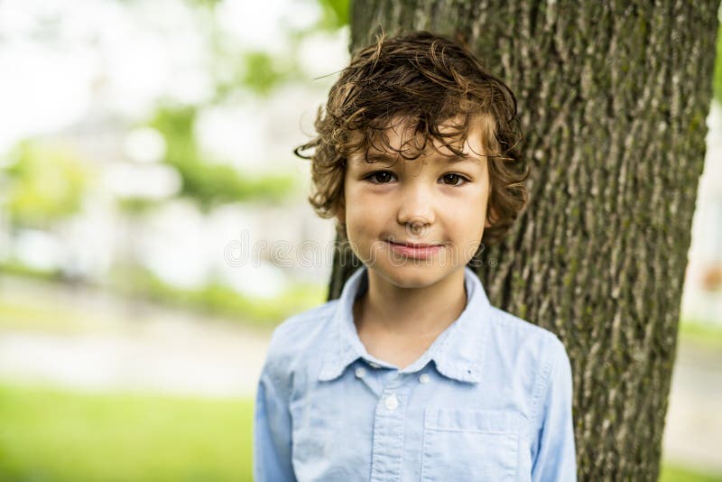 Cute Caucasian Boy Happily Close To a Tree Stock Image - Image of ...