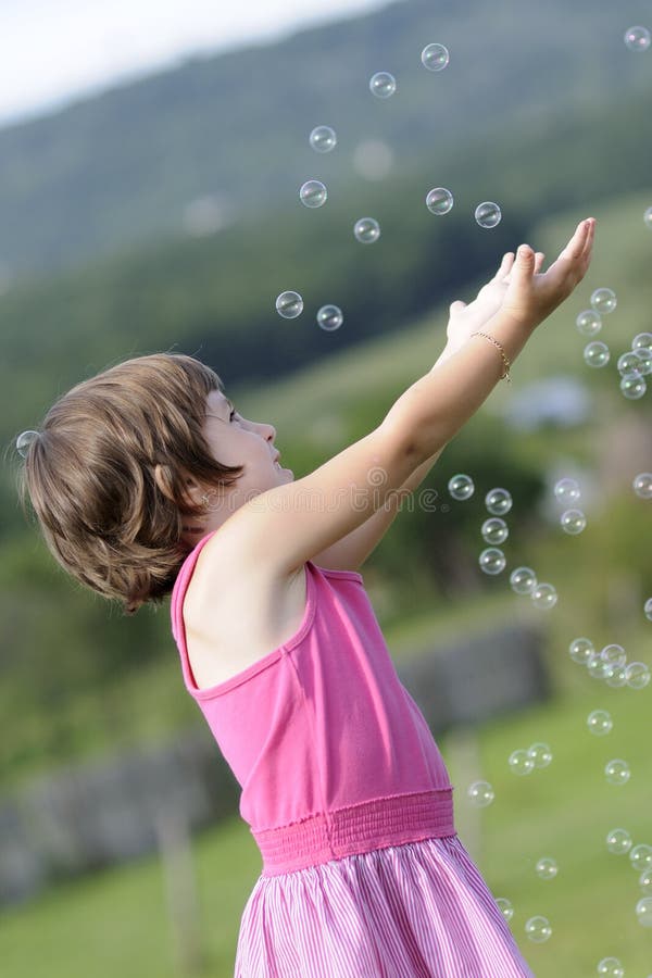 Cute Child Catching Balloons Stock Image - Image of smiling, catching ...