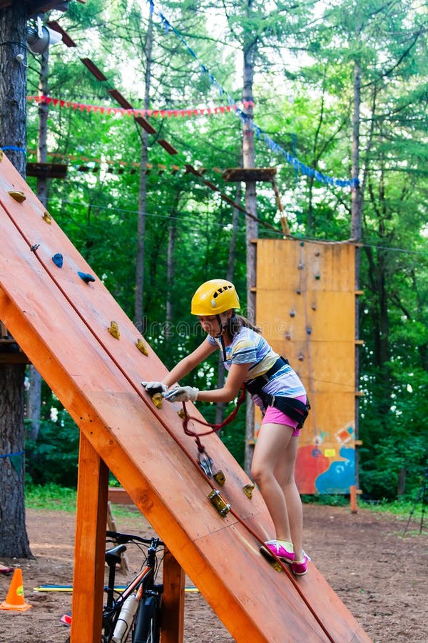 Cute Child Climbing in Adventure Park Stock Photo - Image of female ...
