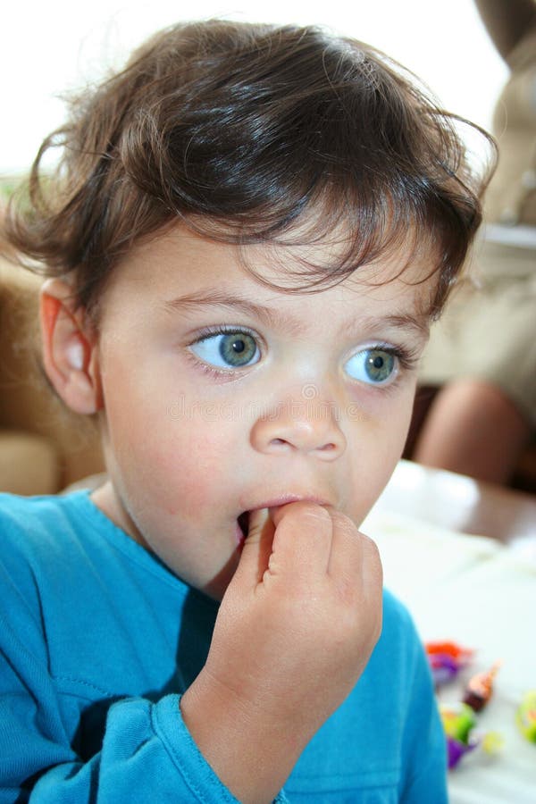 Cute child eating stock image. Image of expression, cheerful - 12157415