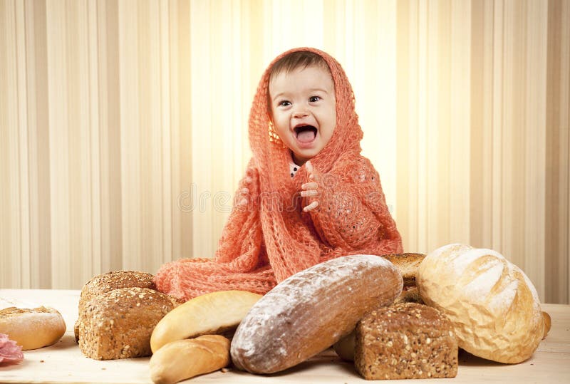 Cute Child Eating Bread Picture. Image: 27933453