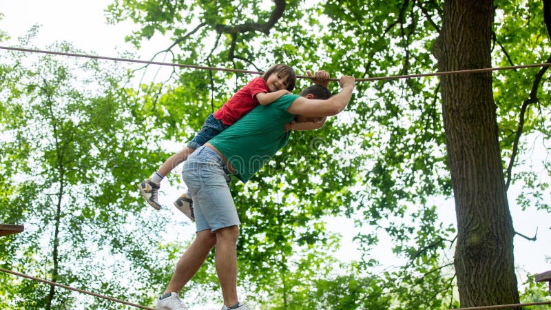 Cute Child and Father, Boy and Dad, Climbing in a Rope Playground ...