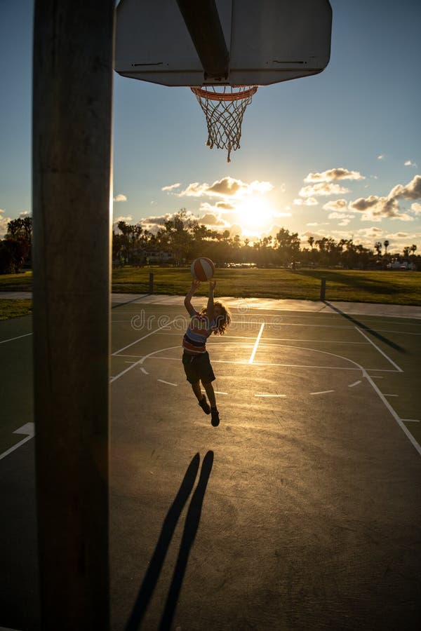 Cute Child Kid Playing Basketball on Sunset. Stock Photo - Image of ...