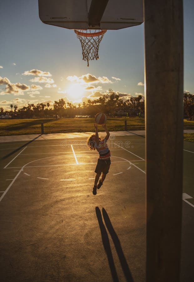 Cute Child Kid Playing Basketball on Sunset. Stock Photo - Image of ...