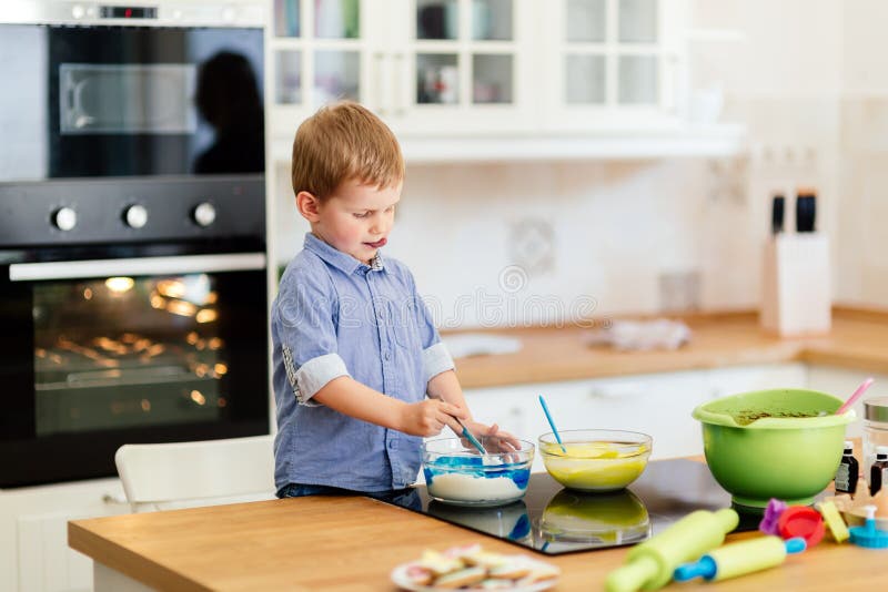 Cute Child Learning To Become a Chef Stock Image - Image of food, happy ... Cute Child Learning To Become a Chef Stock Image - Image of food, happy ...