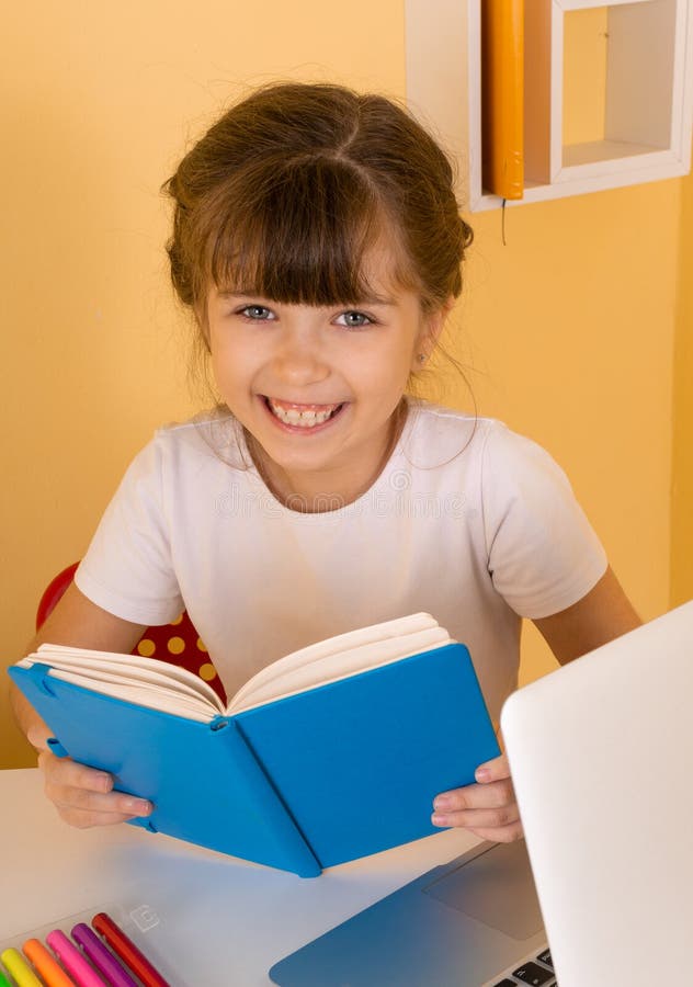 Cute Child with Notebook. Smart Kid with Book at Home Stock Photo ...
