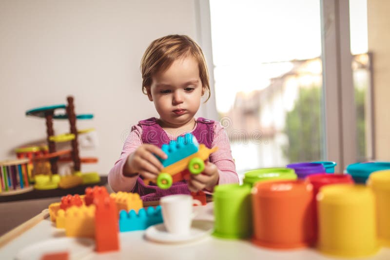 Cute Child Playing on Table at Home Stock Image - Image of ...