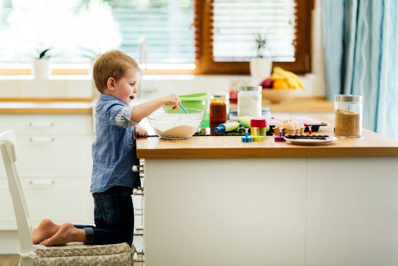Cute Child Learning To Become a Chef since the Age of 2 Stock Image ... Cute Child Learning To Become a Chef since the Age of 2 Stock Image ...