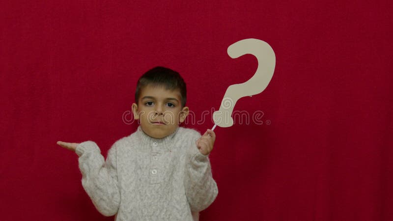 Cute Child Questioning Something. Holding Question Mark , Isolated on ...