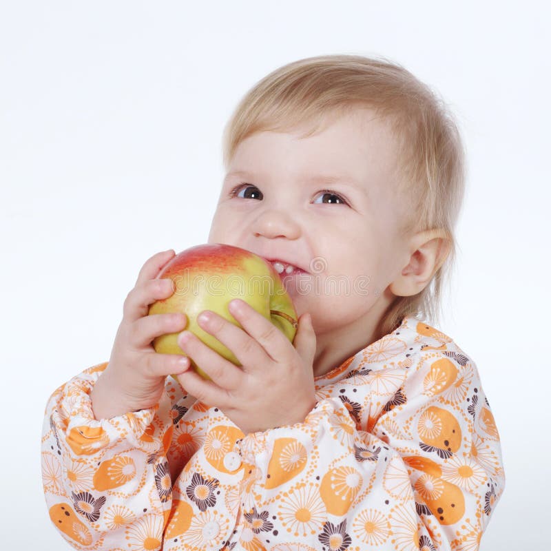 Cute child with red apple. stock image. Image of closeup - 66410851