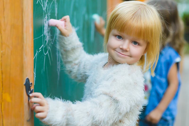 Cute Children Drawing with Chalk on Blackboard Outdoor Stock Photo ...