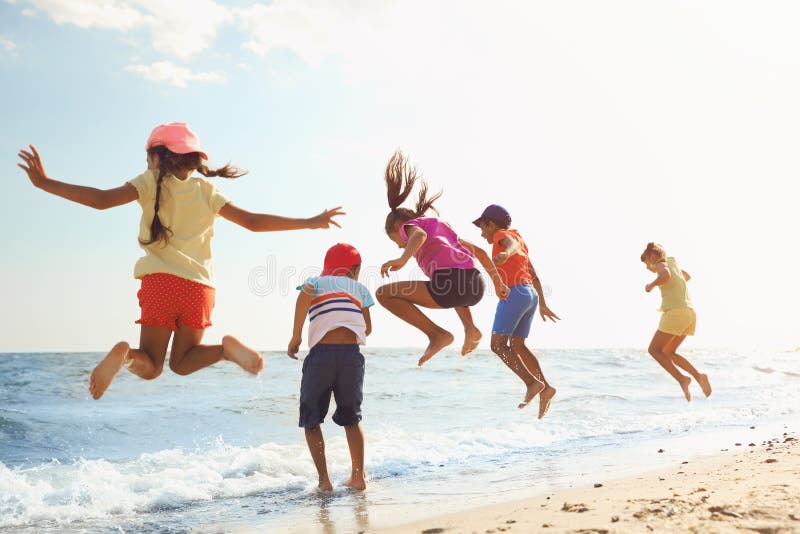 Cute Children Enjoying Sunny Day at Beach. Summer Camp Stock Image ...