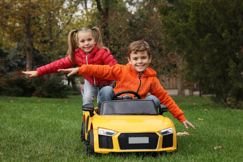 Cute Children Playing with Toy Car in Park Stock Photo - Image of cute ...