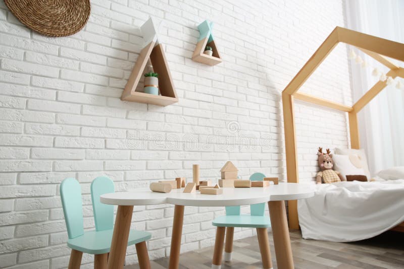 Cute Children`s Room with Bed and Little Table Stock Image - Image of ...