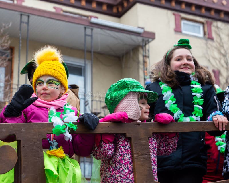 Cute Children Watching the St. Patrick Parade from a Float in Downtown ...
