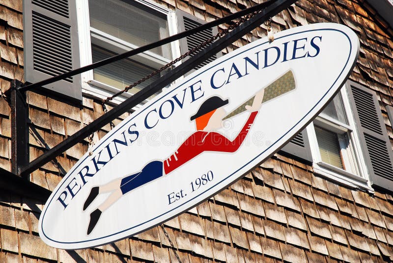 A Cute Colonial Style Sign Hangs Over a Candy Store Editorial Photo ...