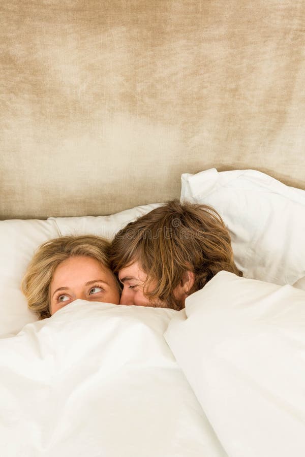Cute couple cuddling stock photo. Image of affection - 67722796