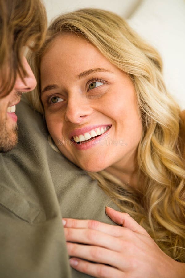 Cute Couple Cuddling on Their Bed Stock Photo - Image of apartment ...