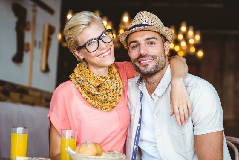 Cute Couple on a Date Looking at the Camera Stock Photo - Image of ...