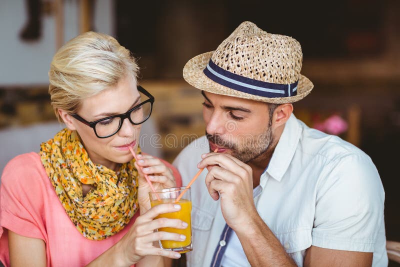Cute Couple on a Date Sharing an Orange Juice Stock Image - Image of ...
