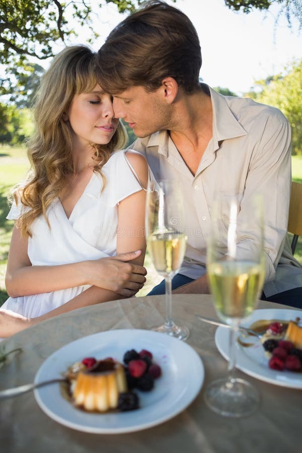 Cute Couple Embracing while on a Date Stock Photo - Image of affection ...
