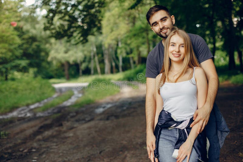 Cute Couple Have a Rest in a Summer Forest Stock Image - Image of ...