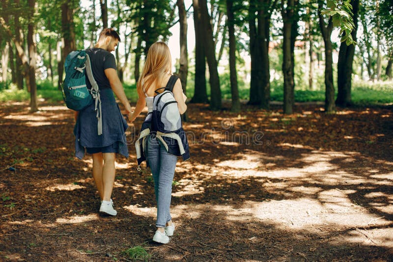 Cute Couple Have a Rest in a Summer Forest Stock Image - Image of ...