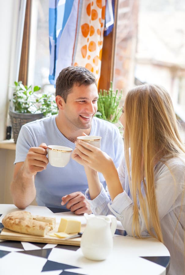 Cute Couple Having Breakfast Together in the Kitchen Stock Image ...