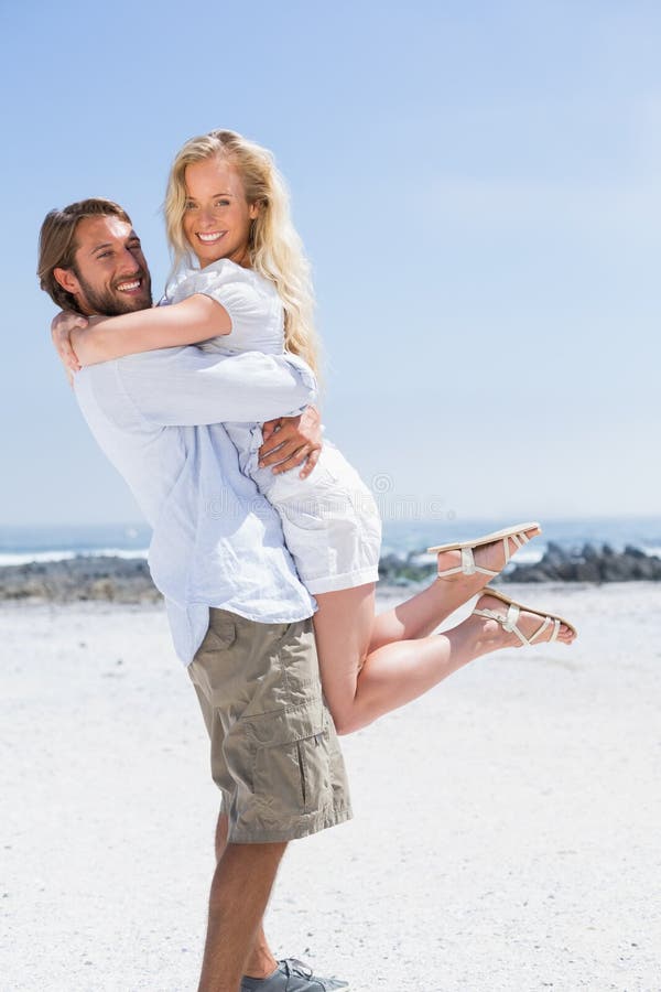 Cute Couple Hugging On The Beach Stock Image Image Of Female Lifting