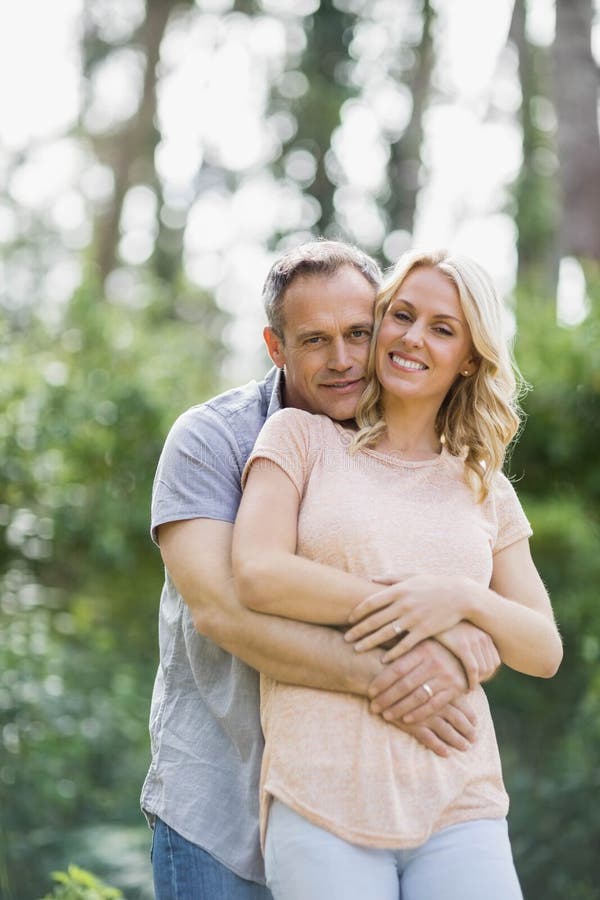 Cute couple hugging stock image. Image of embracing, grass - 66436451