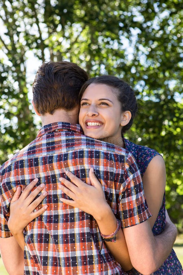 Cute Couple Hugging in the Park Stock Image - Image of leisure ...